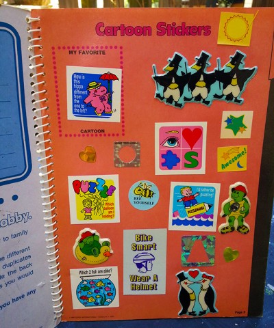 Someone's amazing old sticker album. | Dinosaur Dracula!